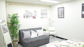 Apartamento | Área de estar | TV de tela plana