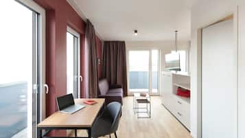 Estúdio Premium (Amazing Apartment) | Sala de estar | Smart TV de 43 polegadas com canais por cabo, televisor