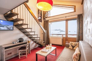 Suite, mezanino | Wi-fi grátis, roupa de cama fornecida 