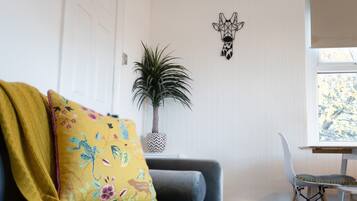 Apartamento Standard | Sala de estar | Smart TV de 50 polegadas com canais digitais, Netflix