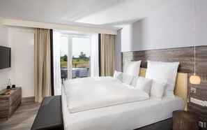 Apartamento clássico, 1 cama King e sofá-cama, para não fumantes, sacada | Vista do quarto