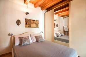 Apartamento, 1 quarto, pátio | 1 quarto, Wi-fi grátis, roupa de cama fornecida 