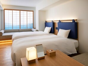 Quarto Twin Deluxe, não fumadores | Secretária, Wi-fi grátis, roupa de cama fornecida