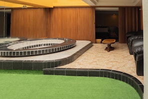 Quarto superior | Área de estar | TV de tela plana