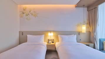 Edredons de pluma, cofres nos quartos, cortinas blackout