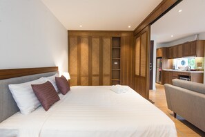 Apartamento Deluxe | 1 quarto, cofre no quarto, com mobília individualizada, secretária