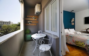 Apartamento família | Sacada
