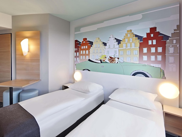 Secretária, quartos insonorizados, Wi-fi grátis