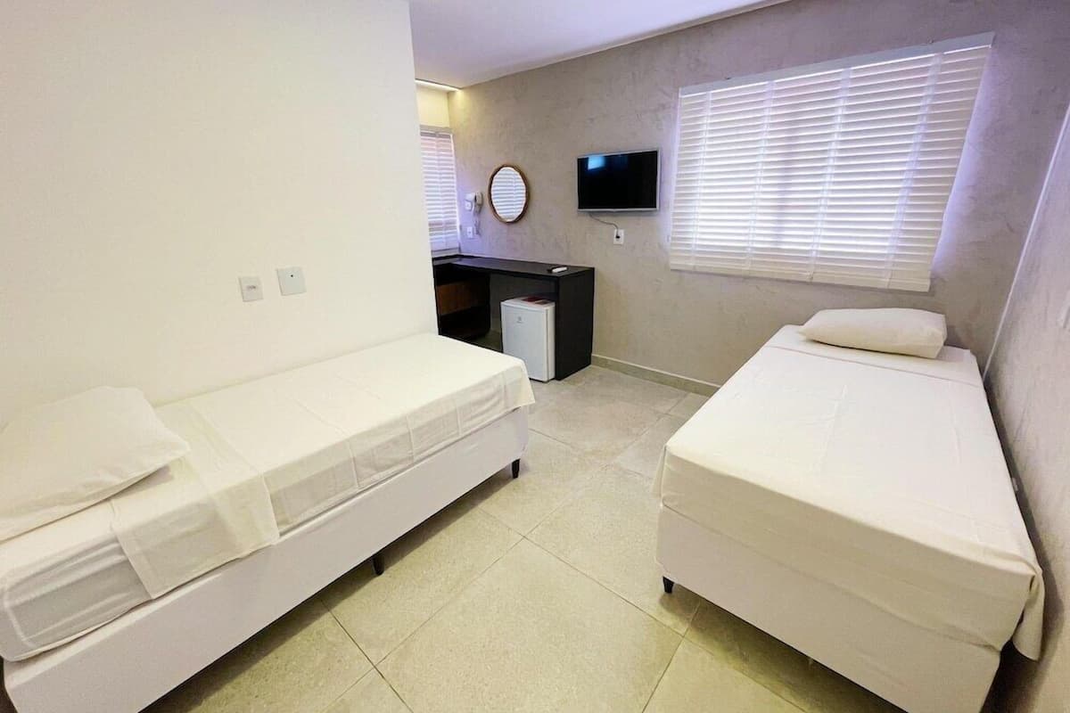 Wi-Fi de cortesia, roupa de cama