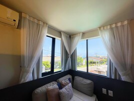 Quarto superluxo, vista para a praia | Wi-Fi de cortesia, roupa de cama