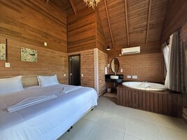 Cabana superluxo, 1 quarto, vista para o jardim | Frigobar, individualmente decorados, individualmente mobiliados