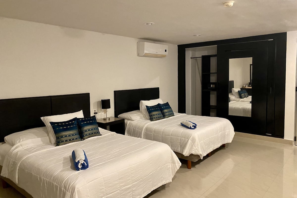 Double Queen Suite | Lençóis italianos Frette, roupa de alta qualidade