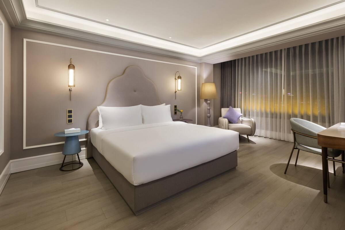Suite Deluxe, 1 cama king-size | Minibar, quartos insonorizados, Wi-fi grátis