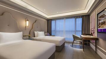 Frigobar, quartos à prova de som, Wi-Fi de cortesia