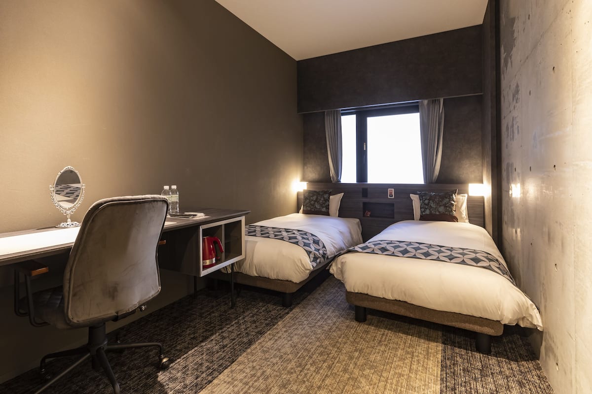 Quarto Twin Deluxe, não fumadores (101UT Urbanics) | Secretária, Wi-fi grátis, roupa de cama fornecida