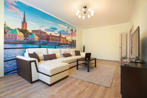 Apartamento Comfort | Sala | Televisor de 40 polegadas com canais por cabo