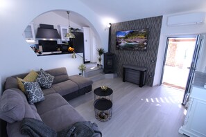 Casa, 3 quartos | Sala de estar | TV de ecrã plano 