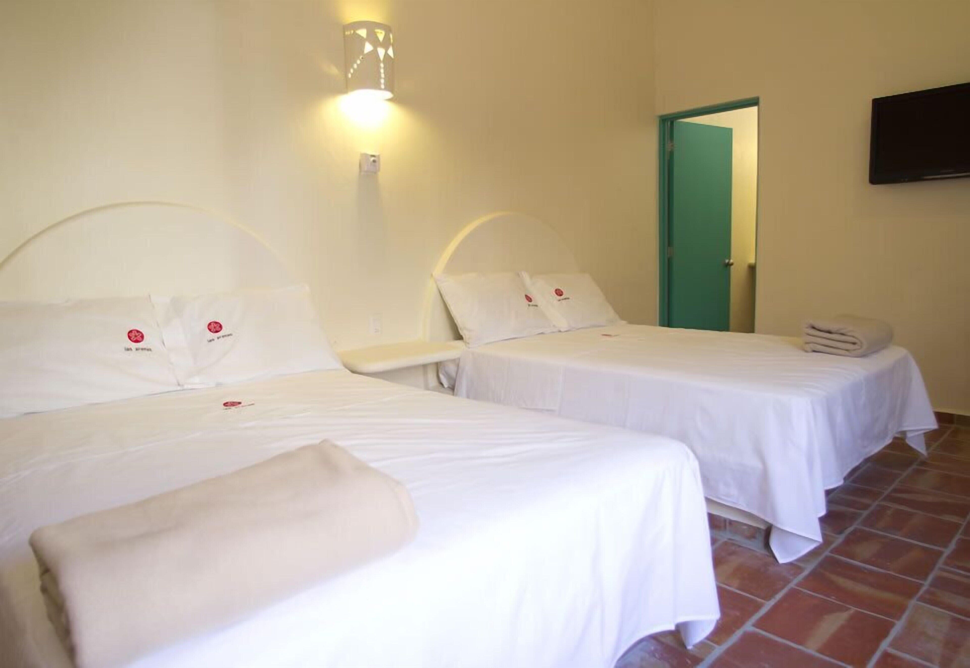 Cofres nos quartos, ferros/tábuas de passar roupa, Wi-Fi de cortesia