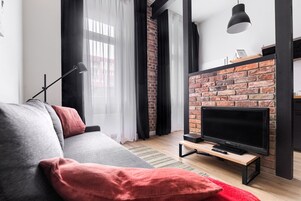 Apartamento Superior | Sala | TV de ecrã plano 