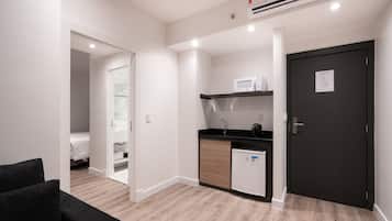 Suíte família | 1 quarto, frigobar, cofres nos quartos, quartos à prova de som