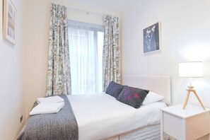 Apartamento | 2 quartos, ferros/tábuas de passar roupa, Wi-Fi de cortesia