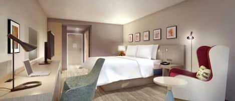 Quarto de hotel moderno com cama, escrivaninha, cadeira e uma pequena mesa.