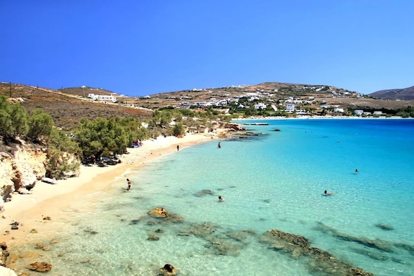 Na praia, toalhas de praia