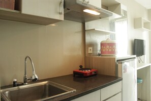 Apartamento, para não fumantes, cozinha americana | Cozinha privada | Geladeira, cooktop, lava-louças, talheres/pratos/utensílios de cozinha