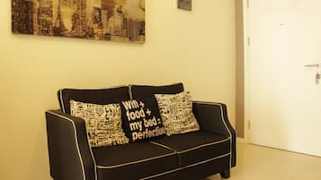 Apartamento, não fumadores, kitchenette | Sala | TV de ecrã plano