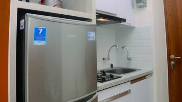 Apartamento, para não fumantes, cozinha americana | Cozinha privada | Geladeira, cooktop, talheres/pratos/utensílios de cozinha