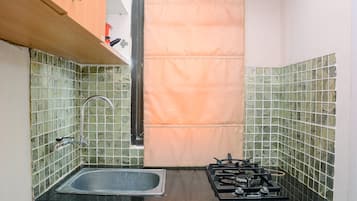 Apartamento, para não fumantes, cozinha americana | 1 quarto, ferros/tábuas de passar roupa, Wi-Fi de cortesia