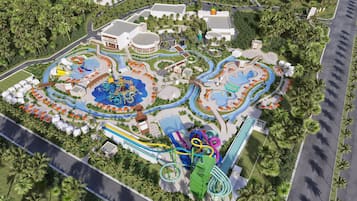 Vista aérea de um resort com vários parques aquáticos, piscinas e diversas comodidades.