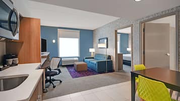 Suite, 1 quarto, não fumadores | Sala de estar | Livros