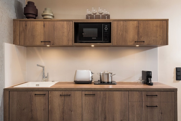 Apartamento, 1 quarto | Cozinha privada | Geladeira, micro-ondas, cooktop, lava-louças