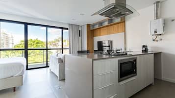 Apartamento | Cozinha privada | Geladeira, micro-ondas, máquina de café expresso
