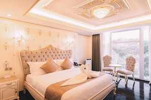 Quarto luxo, 1 cama King, vista para o jardim | Vista para a montanha