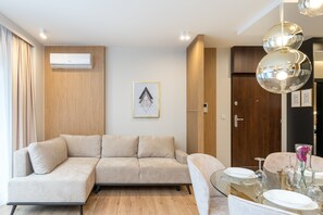 Apartamento Exclusivo | Sala de estar | TV de ecrã plano 