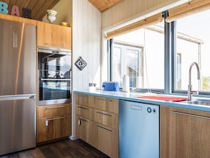 Casa | Cozinha privada | Um frigorífico, um micro-ondas, uma placa de cozinha 