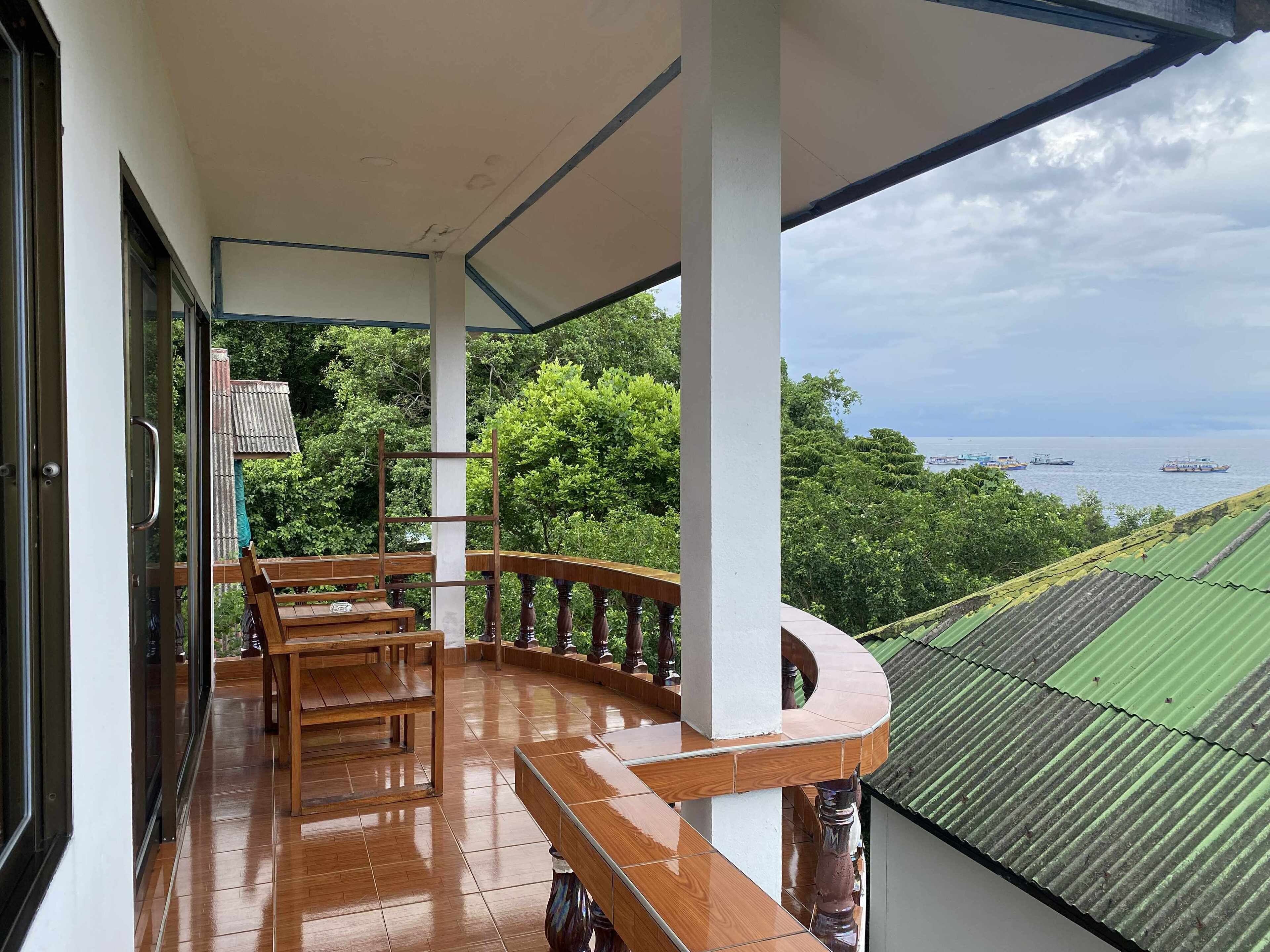 Quarto triplo superior, vista parcial para o oceano | Roupas de cama antialérgicas, Wi-Fi de cortesia