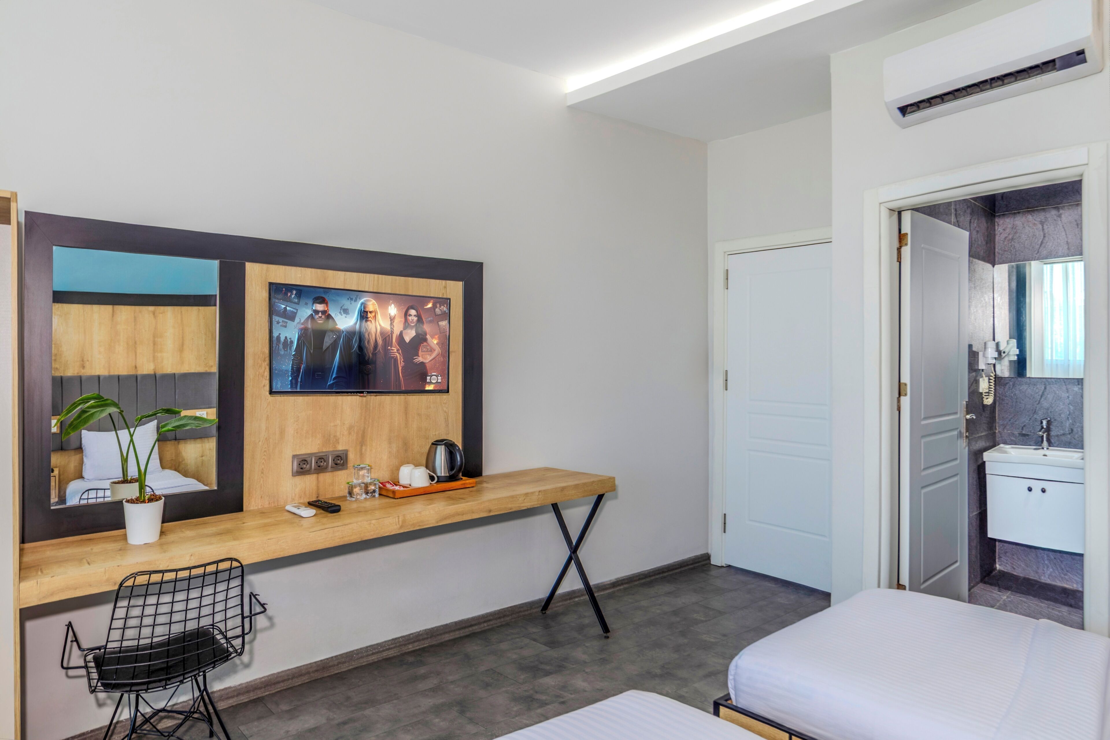 Quarto Triplo Deluxe | Sala de estar | Smart TV de 82 cm com canais via satélite, televisor 