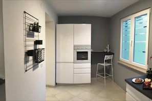 Apartamento standard | Cozinha privada | Cafeteira/chaleira, chaleira elétrica