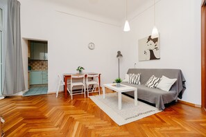 Apartamento conforto | Sala de estar | TV de tela plana