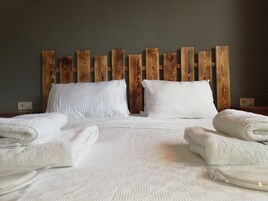 Apartamento Familiar | Minibar com produtos grátis, com decoração personalizada 