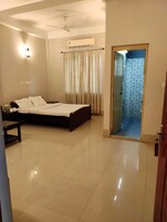 Quarto Deluxe | Roupa de cama fornecida 