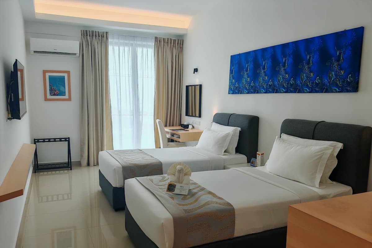 Quarto duplo superior | Escrivaninha, Wi-Fi de cortesia, roupa de cama