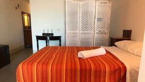 Apartamento, 1 quarto, varanda, vista para o oceano | 1 quarto, roupa de cama fornecida 