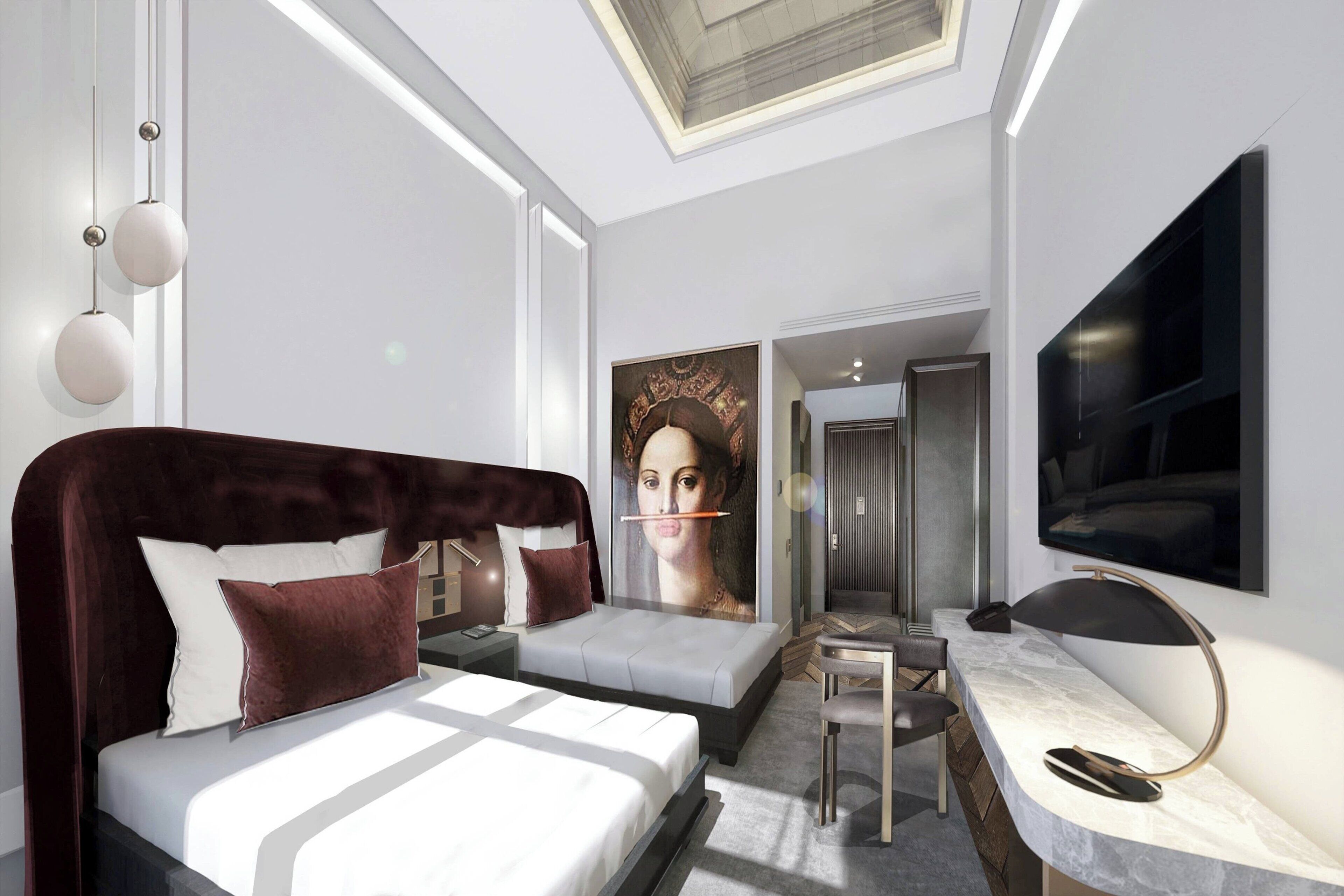 Quarto, 2 camas individuais | Minibar, cofre com capacidade para portátil, secretária 