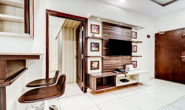 Quarto Deluxe | Sala de estar | Televisor