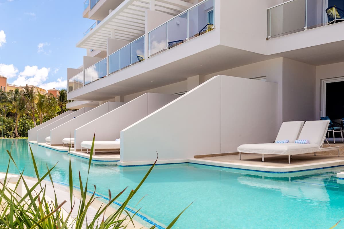 Suíte lua de mel, de frente para a praia (Swim-up) | Roupas de cama premium, camas com colchões pillow-top, frigobar