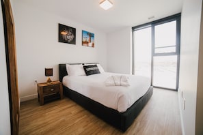 Apartamento, 2 quartos | Ferros/tábuas de passar roupa, Wi-Fi de cortesia